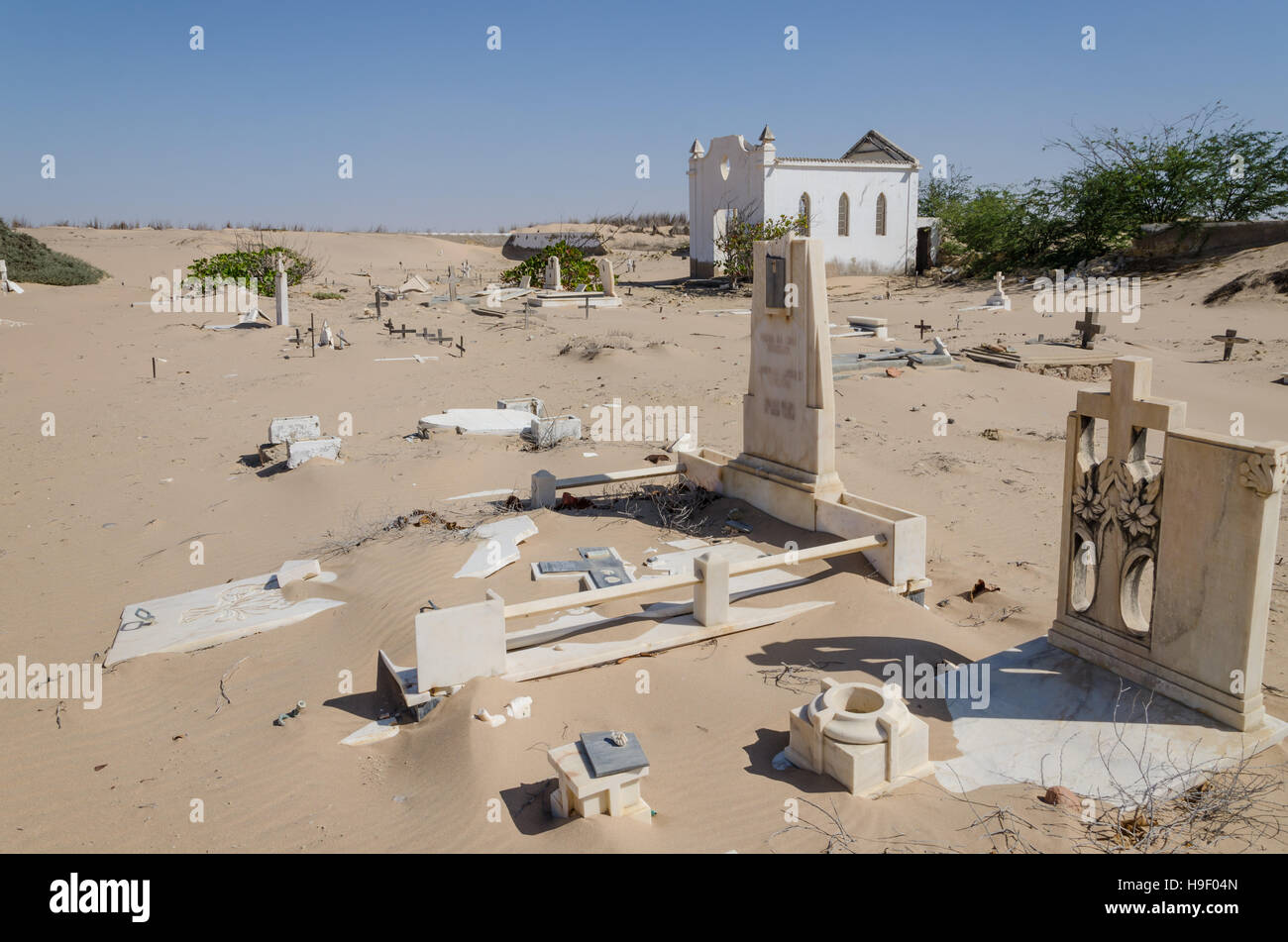 Abandoned graveyard with crumbling stones and crosses in Namib Desert ...