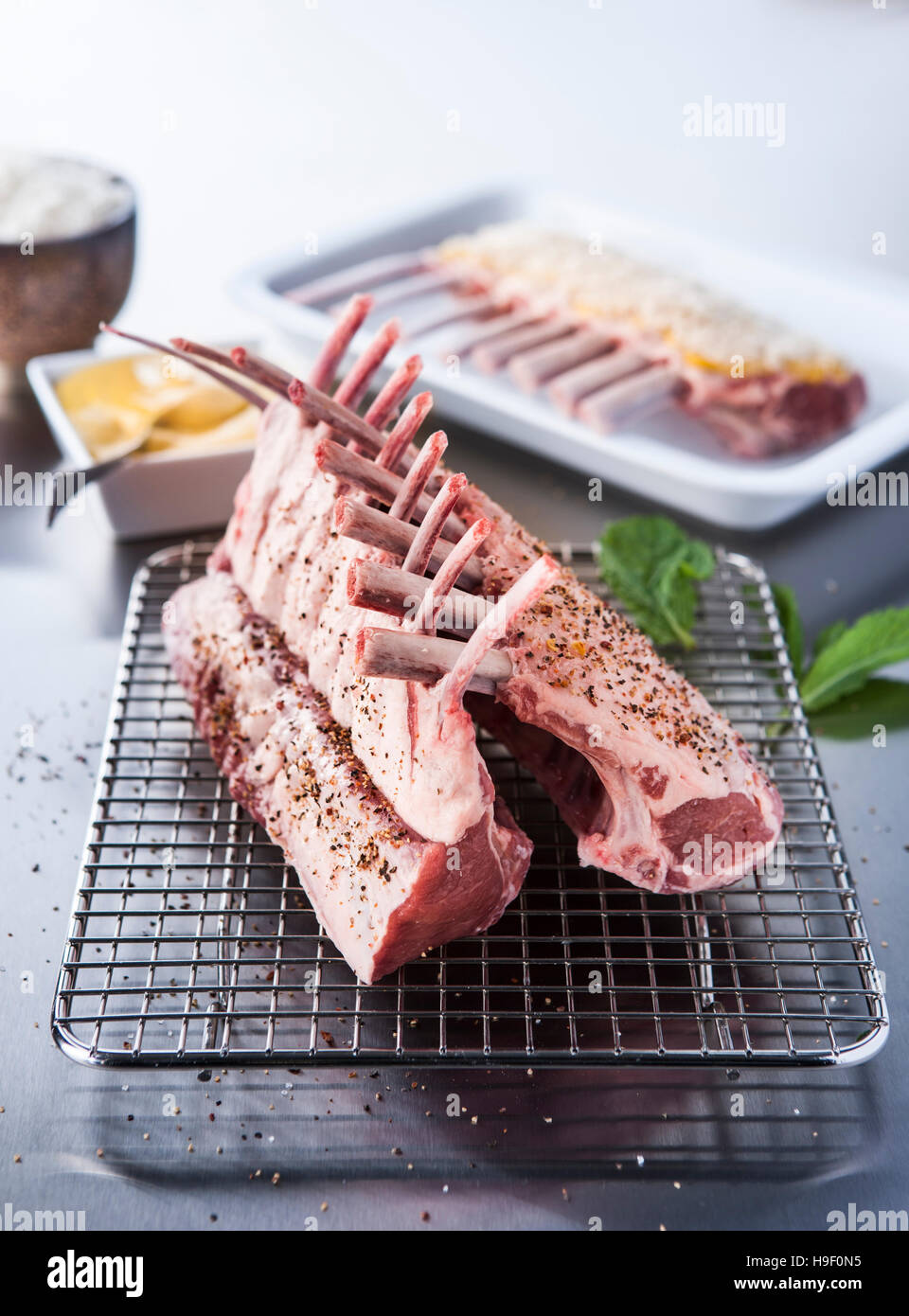 Raw racks of lamb rib Stock Photo - Alamy