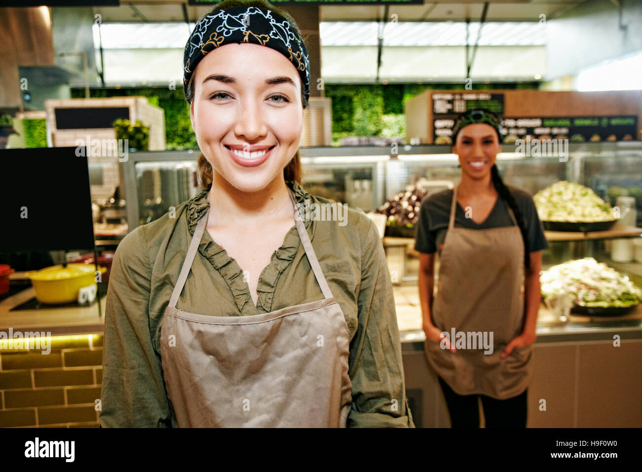 View restaurant workers smiling hi-res stock photography and images - Alamy