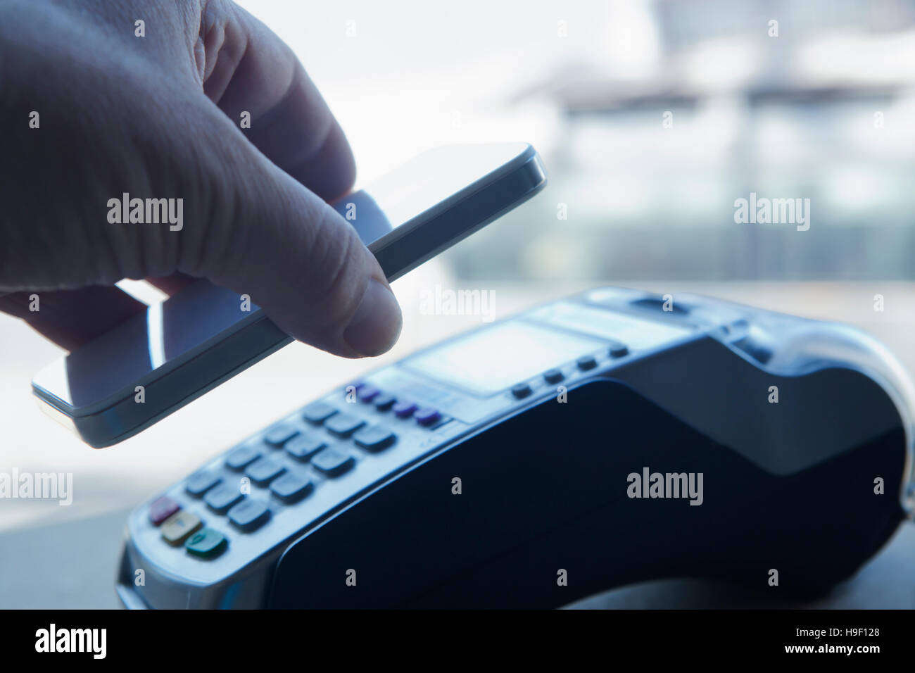 Smart phone cash money dollars hi-res stock photography and images - Alamy