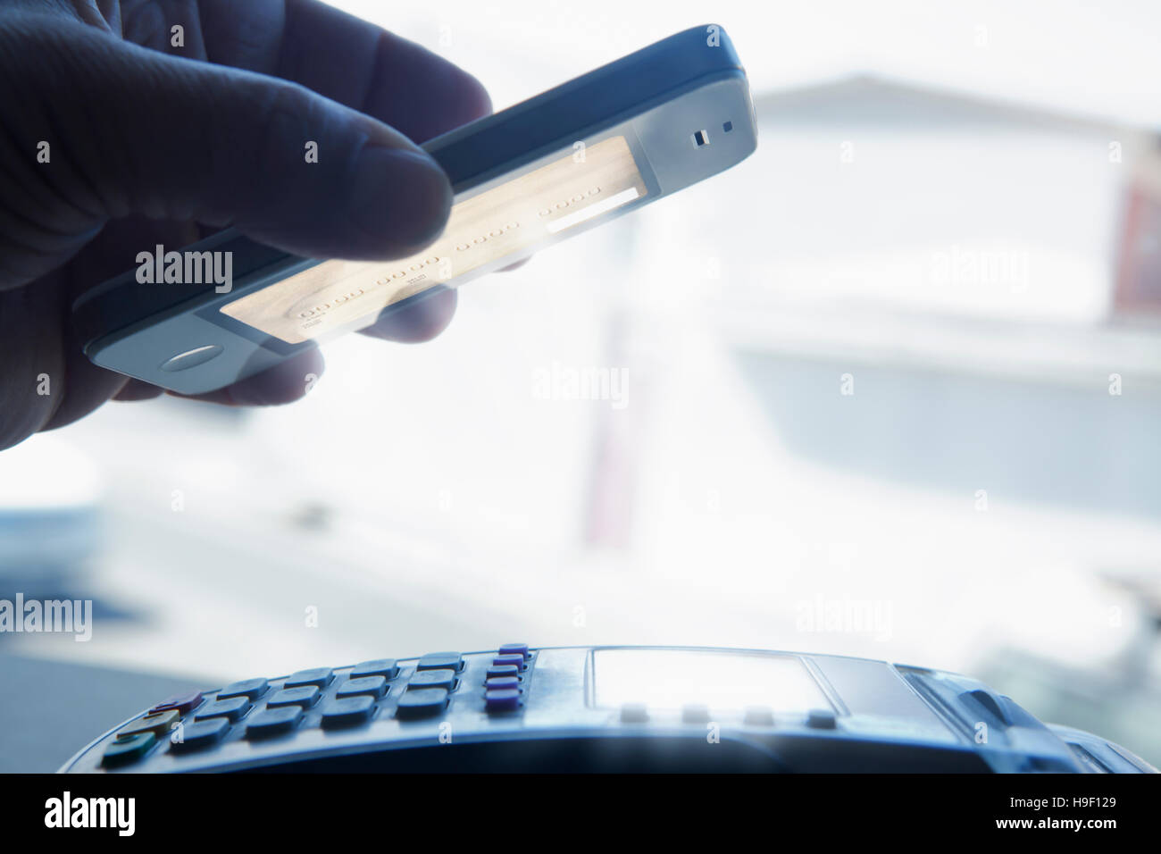 Smart phone cash money dollars hi-res stock photography and images - Alamy