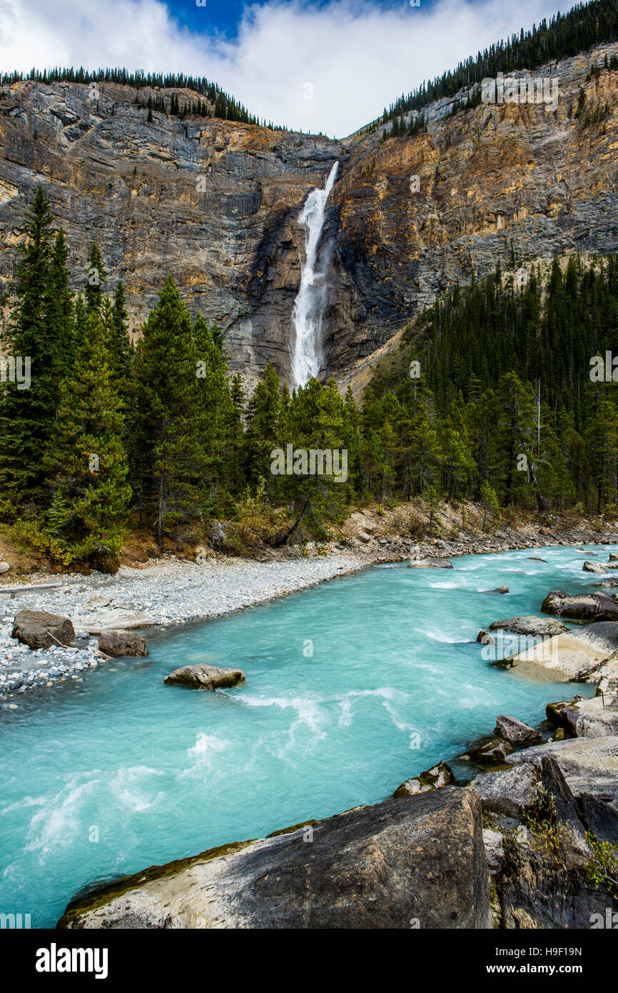 Waterfall flowing over cliff Stock Photo - Alamy