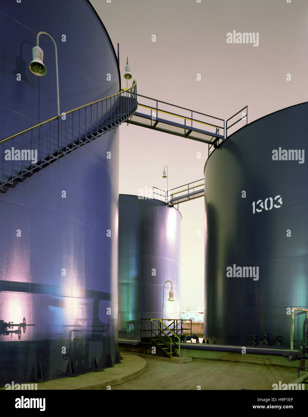 Blue storage tanks Stock Photo - Alamy