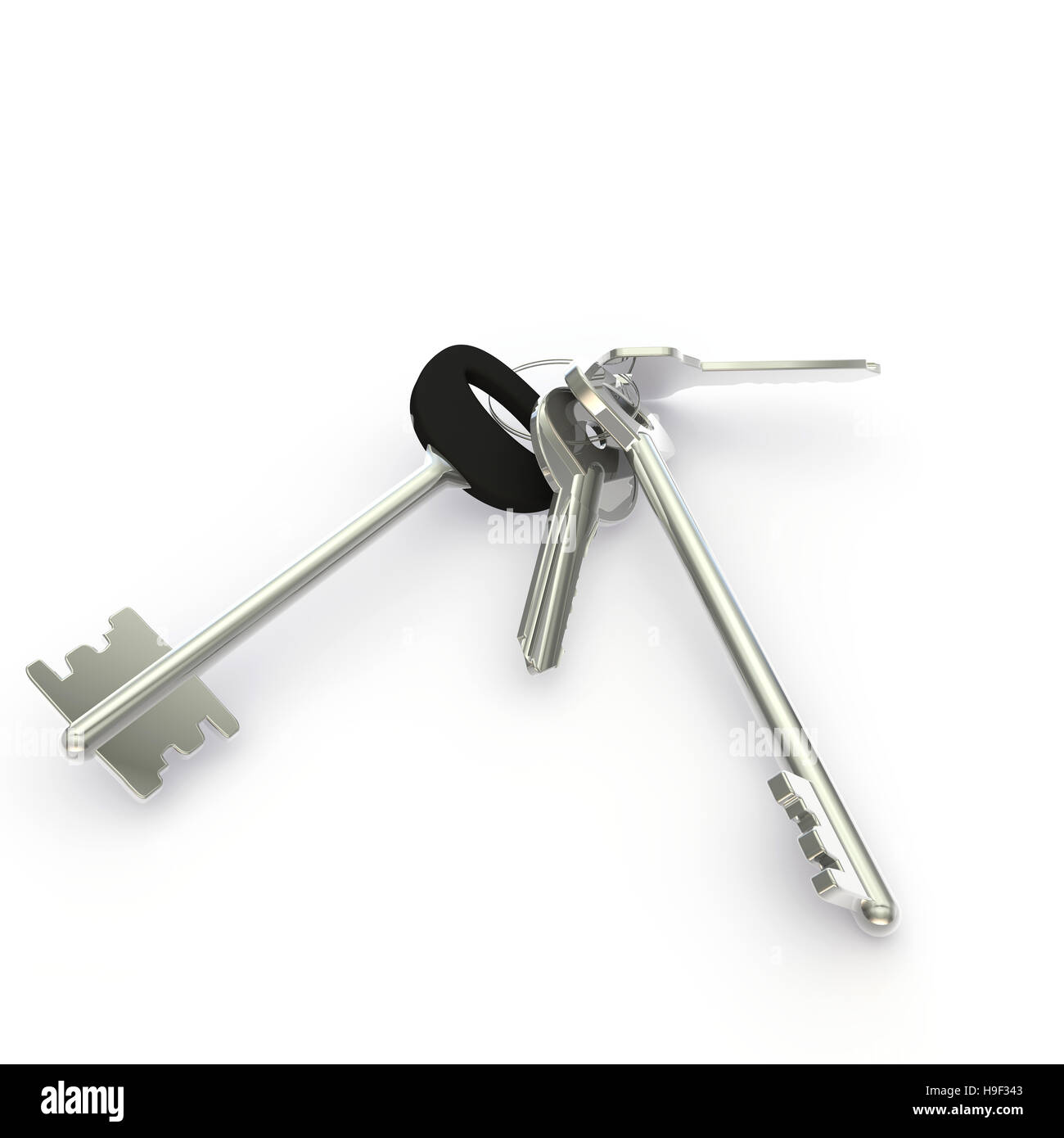 A bunch of big and small door keys. Isolated background Stock Photo - Alamy