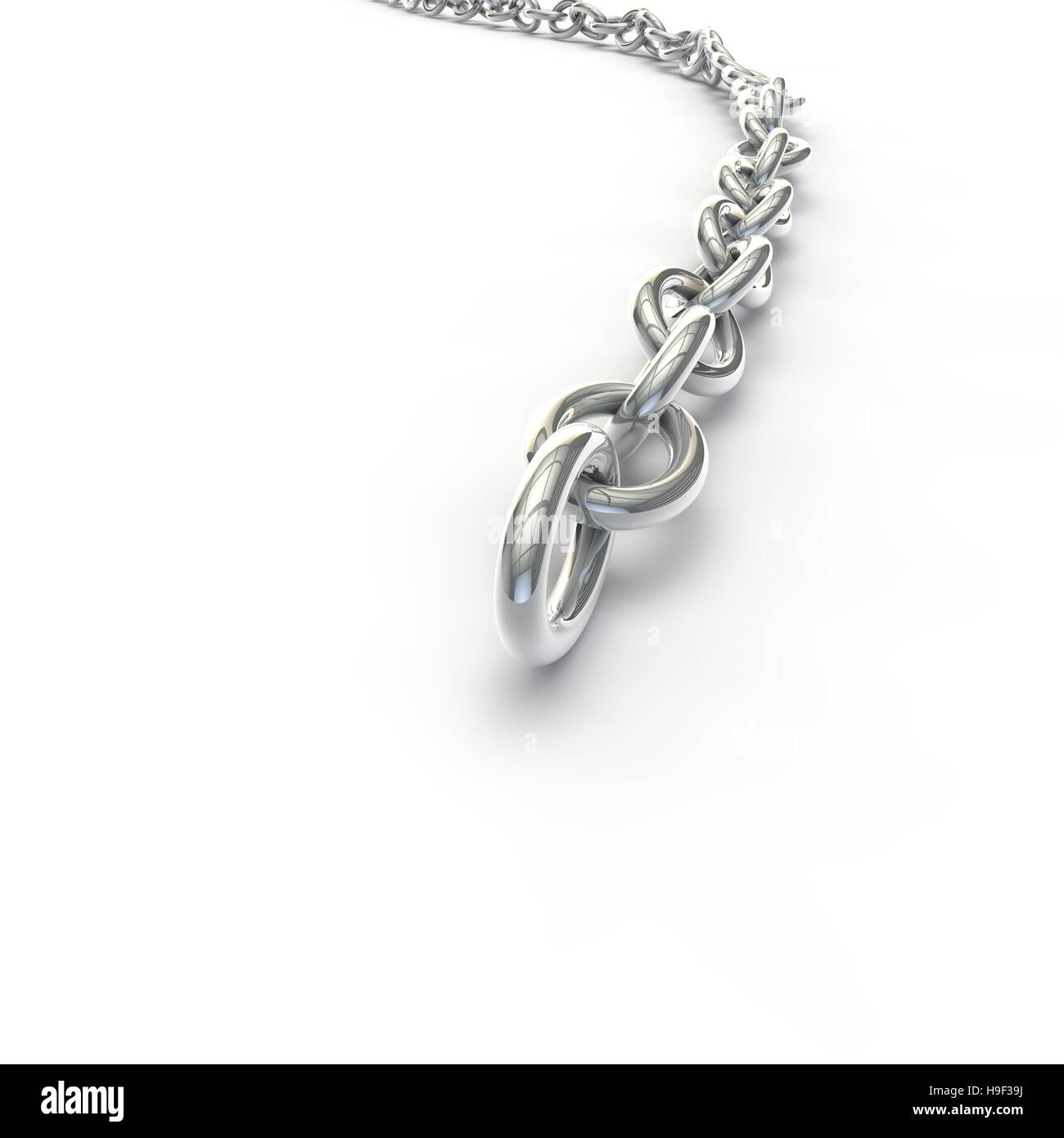 Metal silver chain lying on the floor. Isolated white background Stock ...