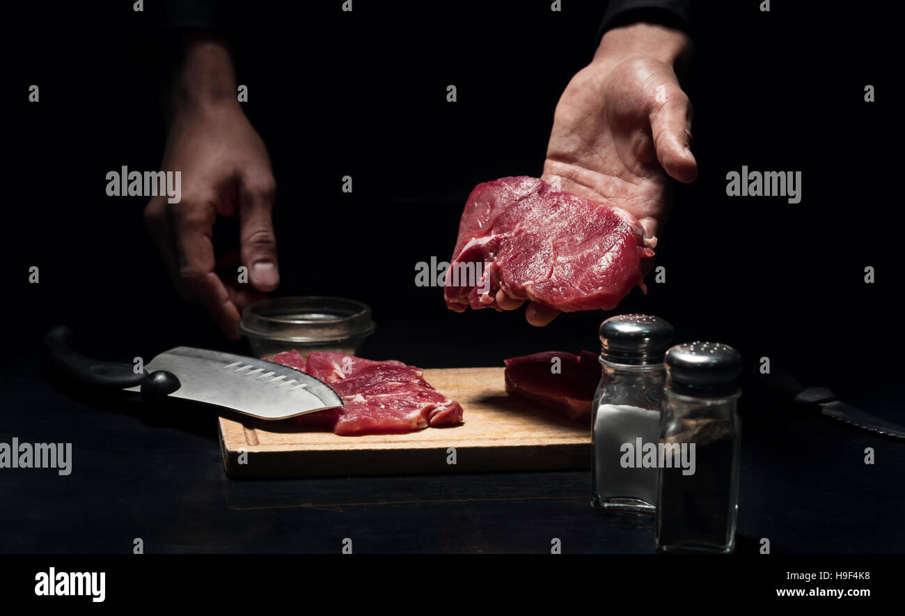 Hands holding meat hi-res stock photography and images - Alamy