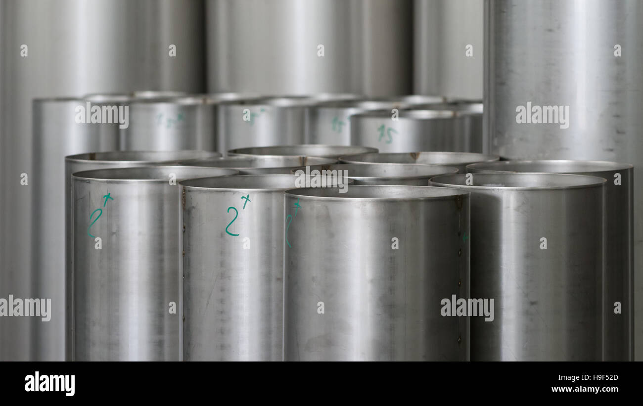 Thin walled steel pipes standing in storage Stock Photo - Alamy