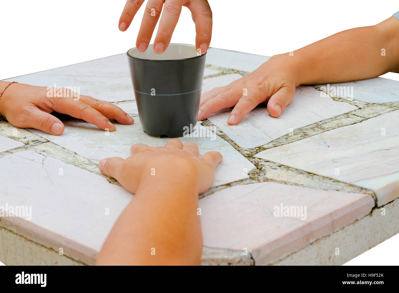 The struggle,hand on table with the cup on white background Stock Photo ...