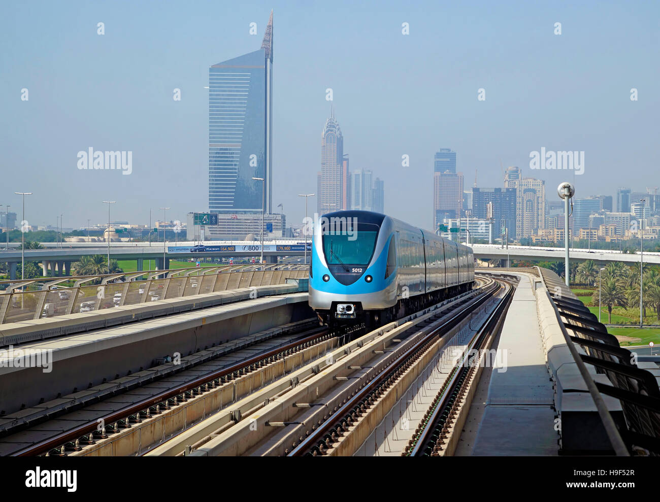 Metro train on the Red line in Dubai Stock Photo - Alamy