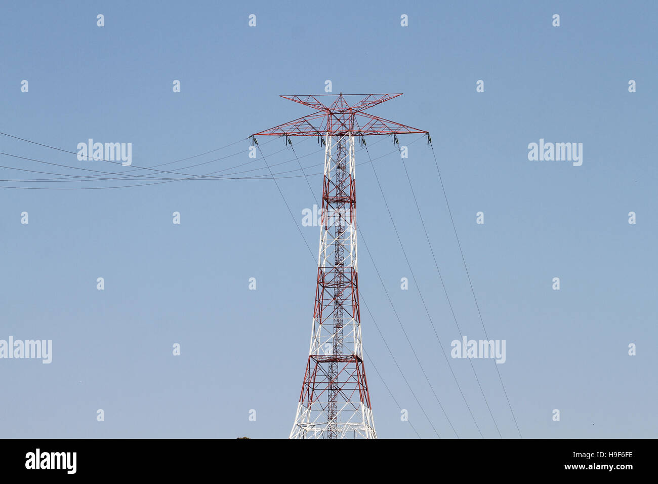 Red and White High Voltage Electric Pole Stock Photo - Alamy