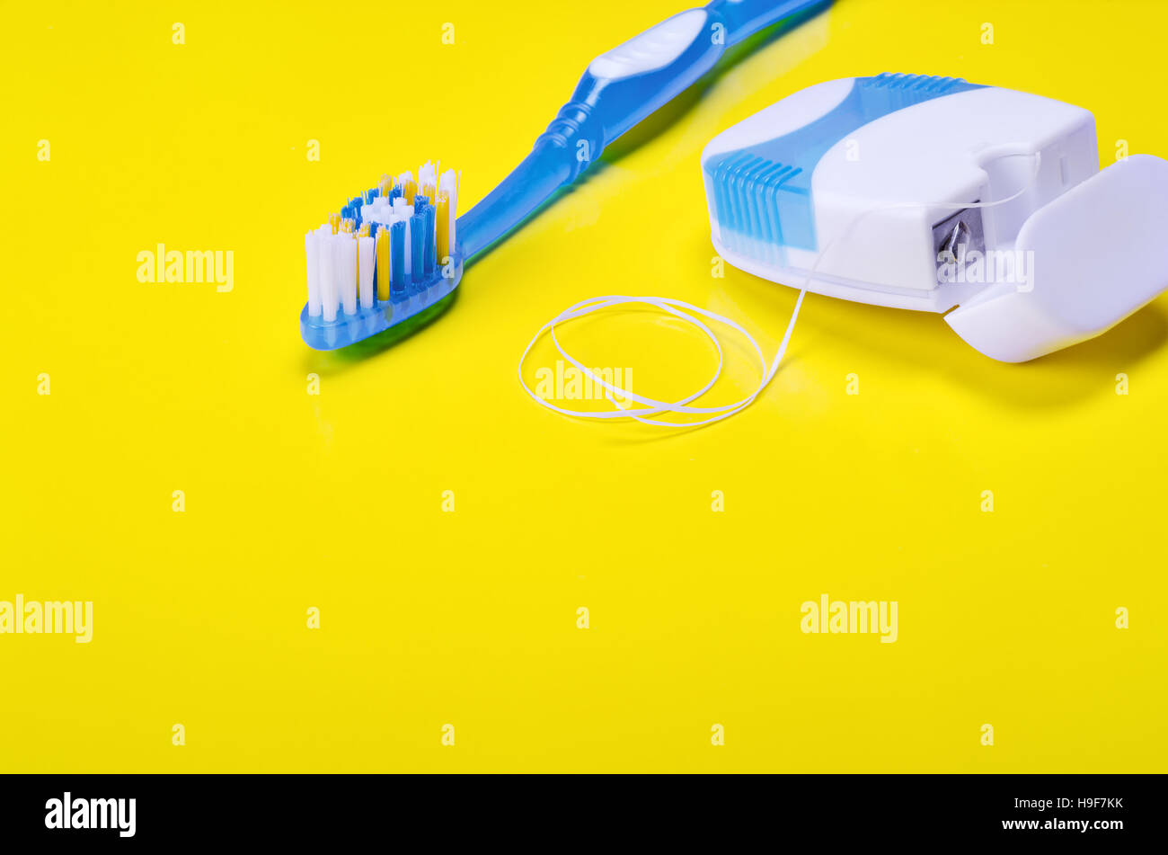 Floss tooth brush hi-res stock photography and images - Alamy