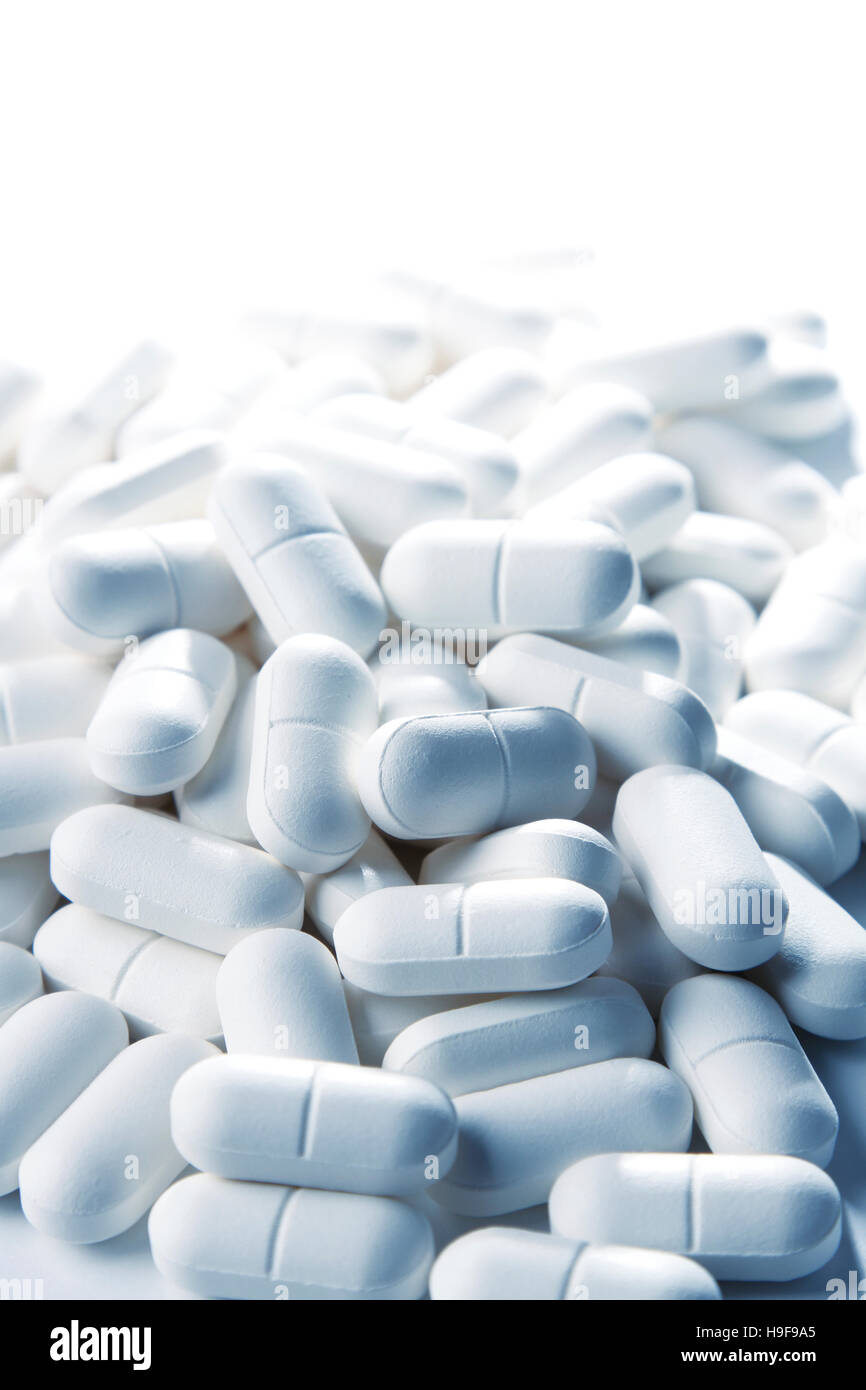 Pile of tablets closeup Stock Photo - Alamy