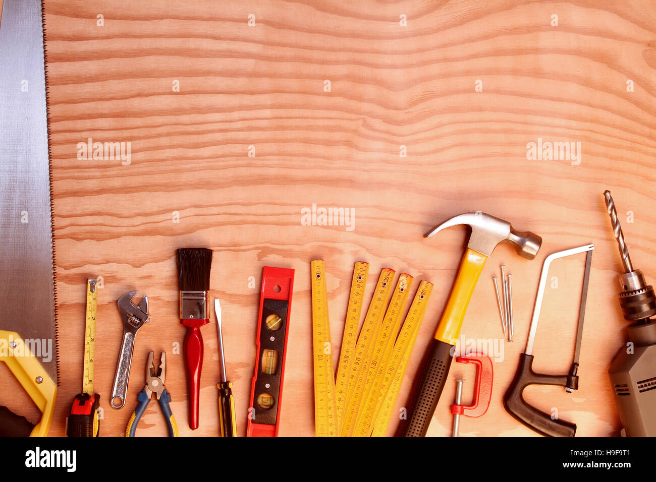 Assorted work tools on wood Stock Photo - Alamy