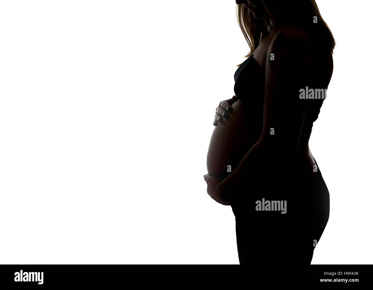 The sweet expectation of a pregnant on white background Stock Photo - Alamy