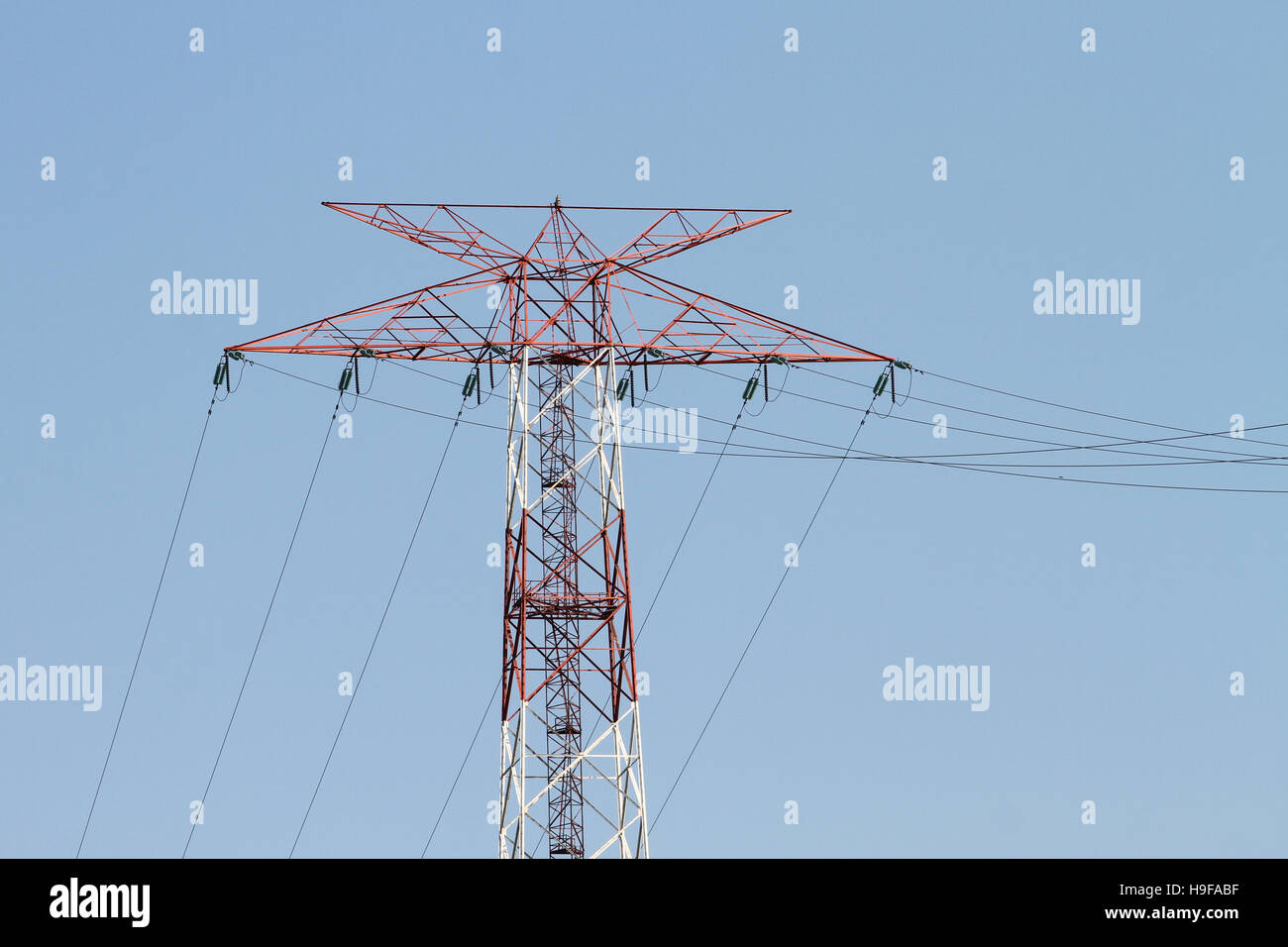 Red and White High Voltage Electric Pole Stock Photo - Alamy