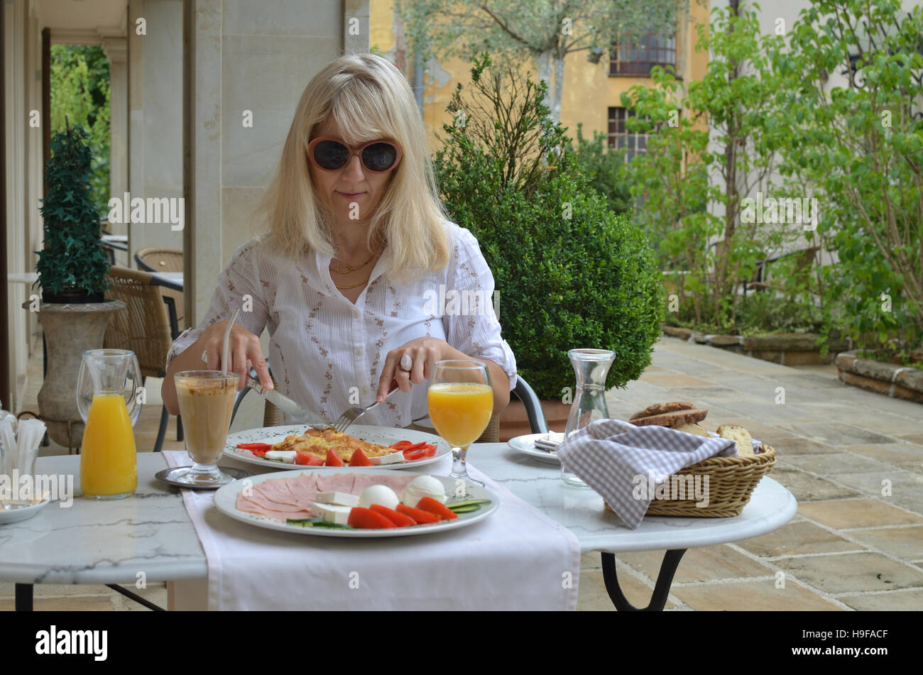 Lady at the breakfast table hi-res stock photography and images - Alamy