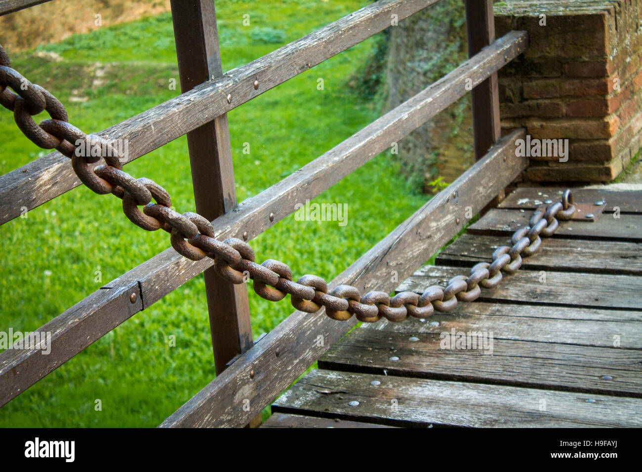 large iron chain on an old castle bridge Stock Photo - Alamy
