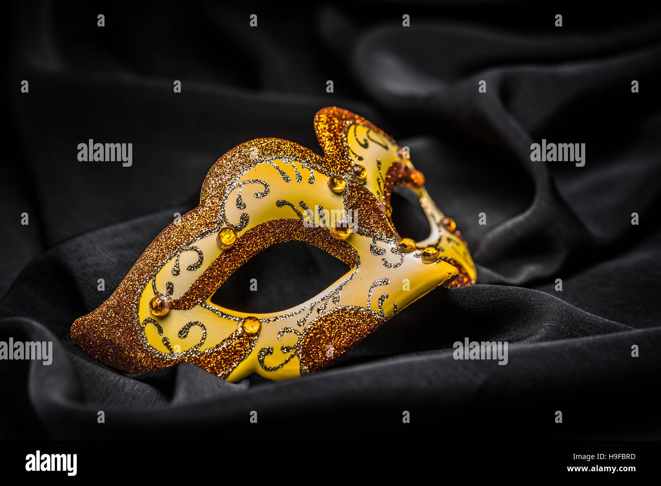 Yellow carnival mask Stock Photo - Alamy