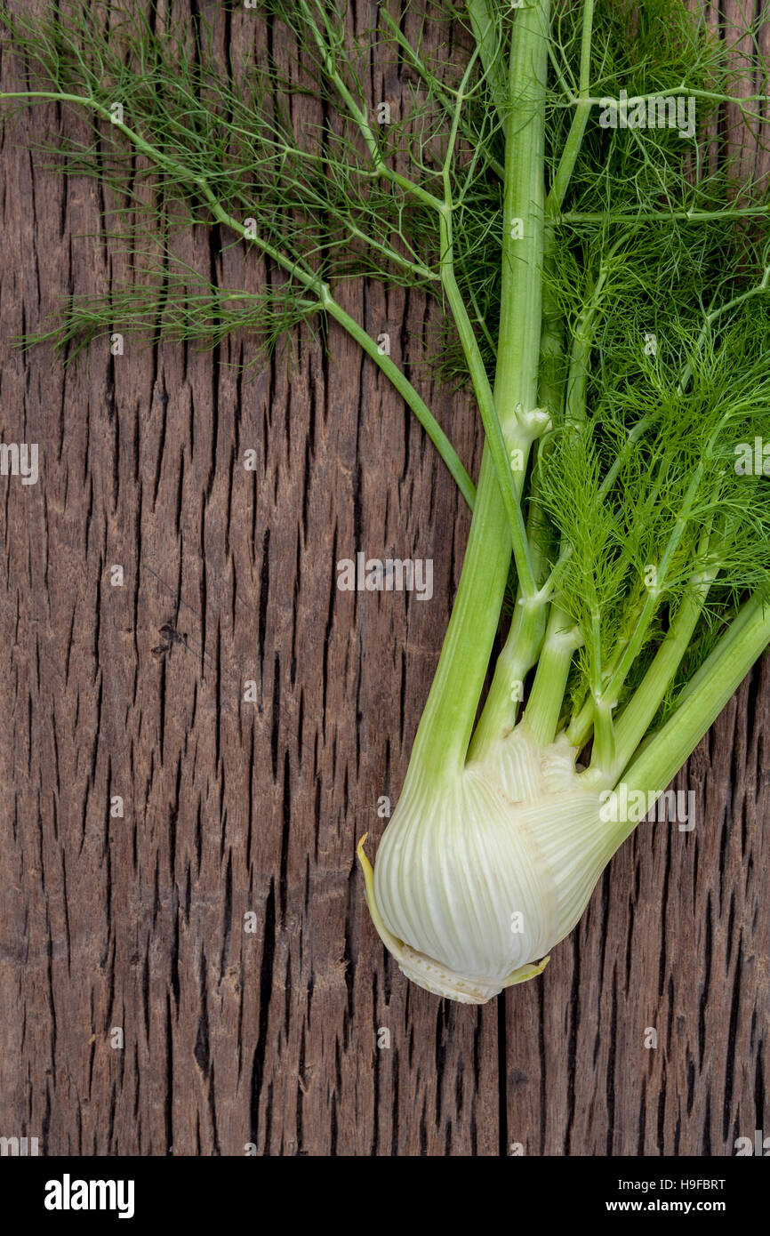 Fresh organic fennel bulbs for culinary purposes on wooden backg Stock ...