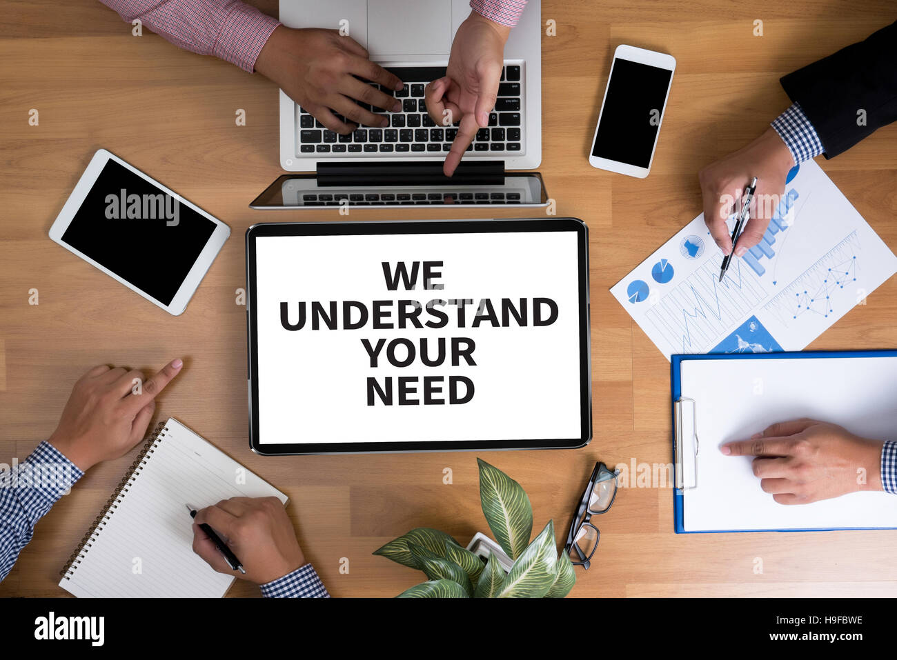 WE UNDERSTAND YOUR NEEDS Stock Photo - Alamy
