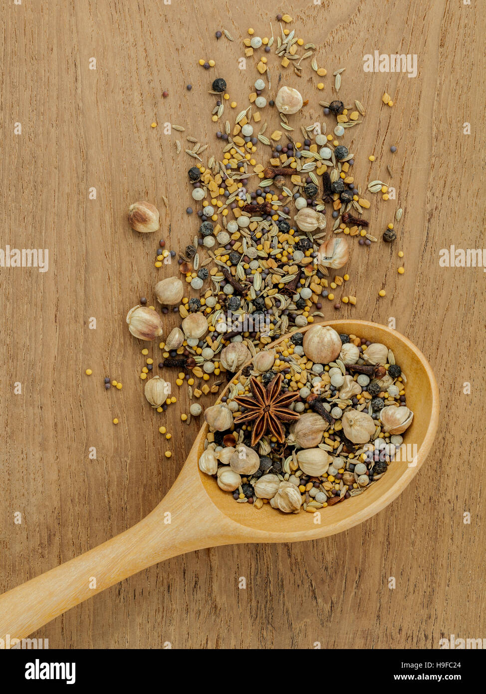 Assorted of spices in wooden spoon black pepper ,white pepper Stock ...