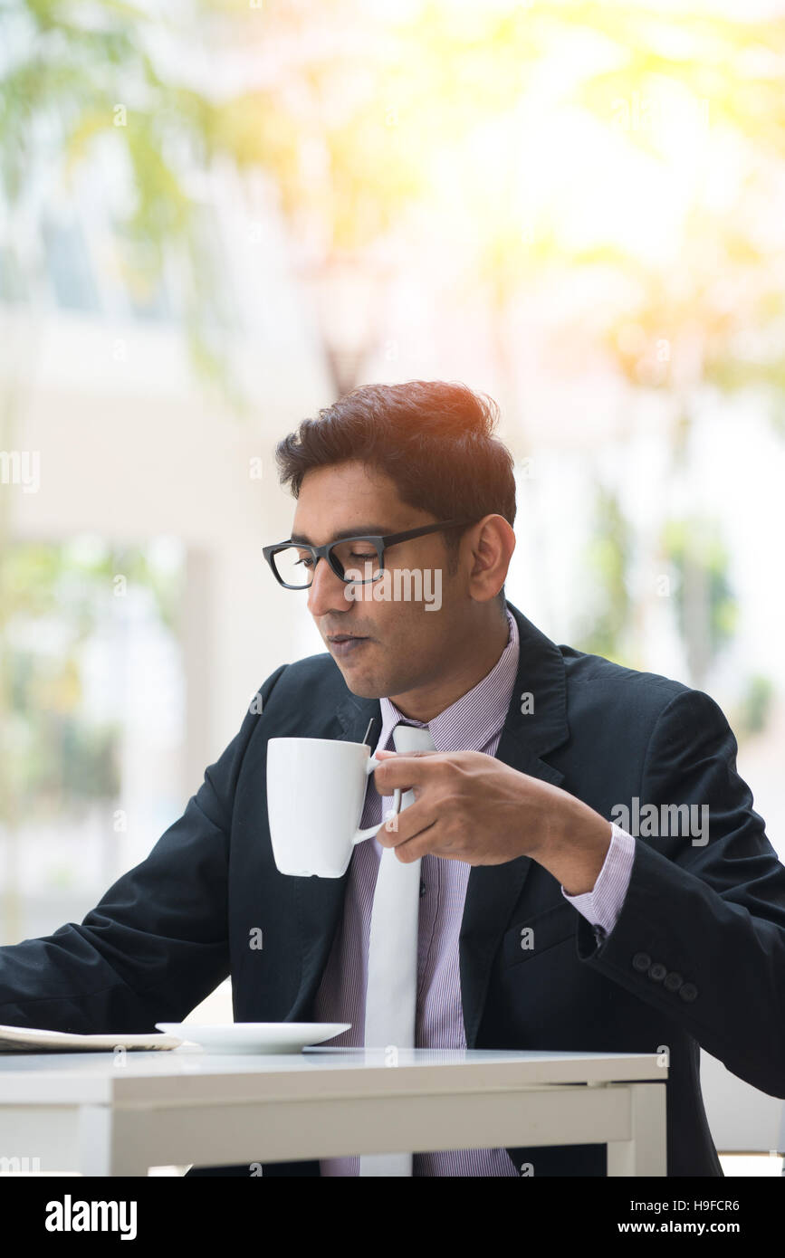 indian male drinking at cafe Stock Photo - Alamy