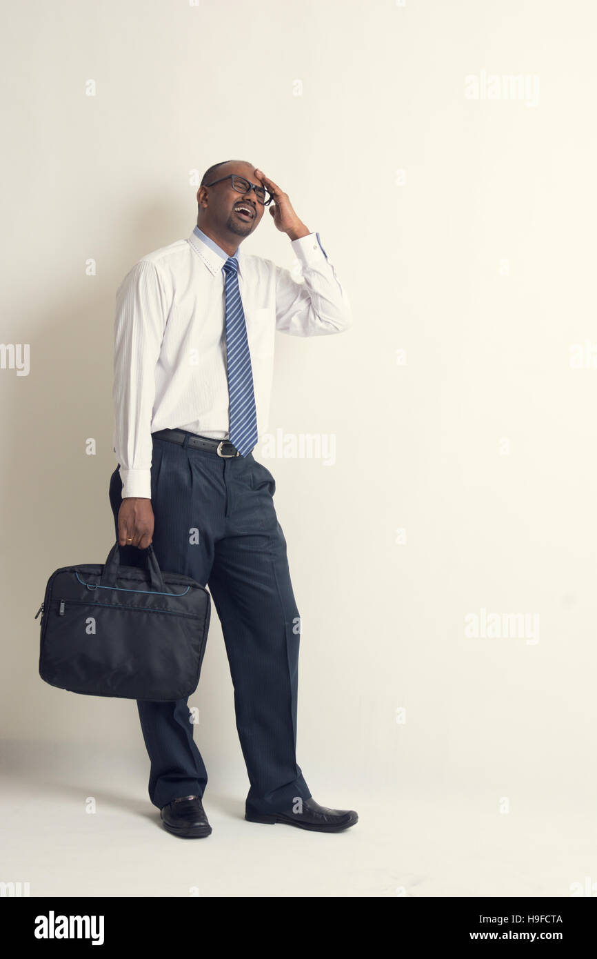 indian male businessman with stressful look Stock Photo - Alamy