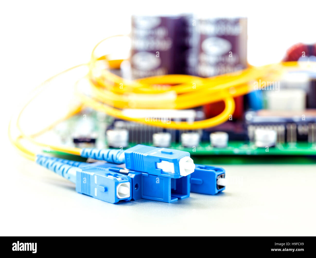 Closeup of fiber optic connector with Circuits board Stock Photo - Alamy