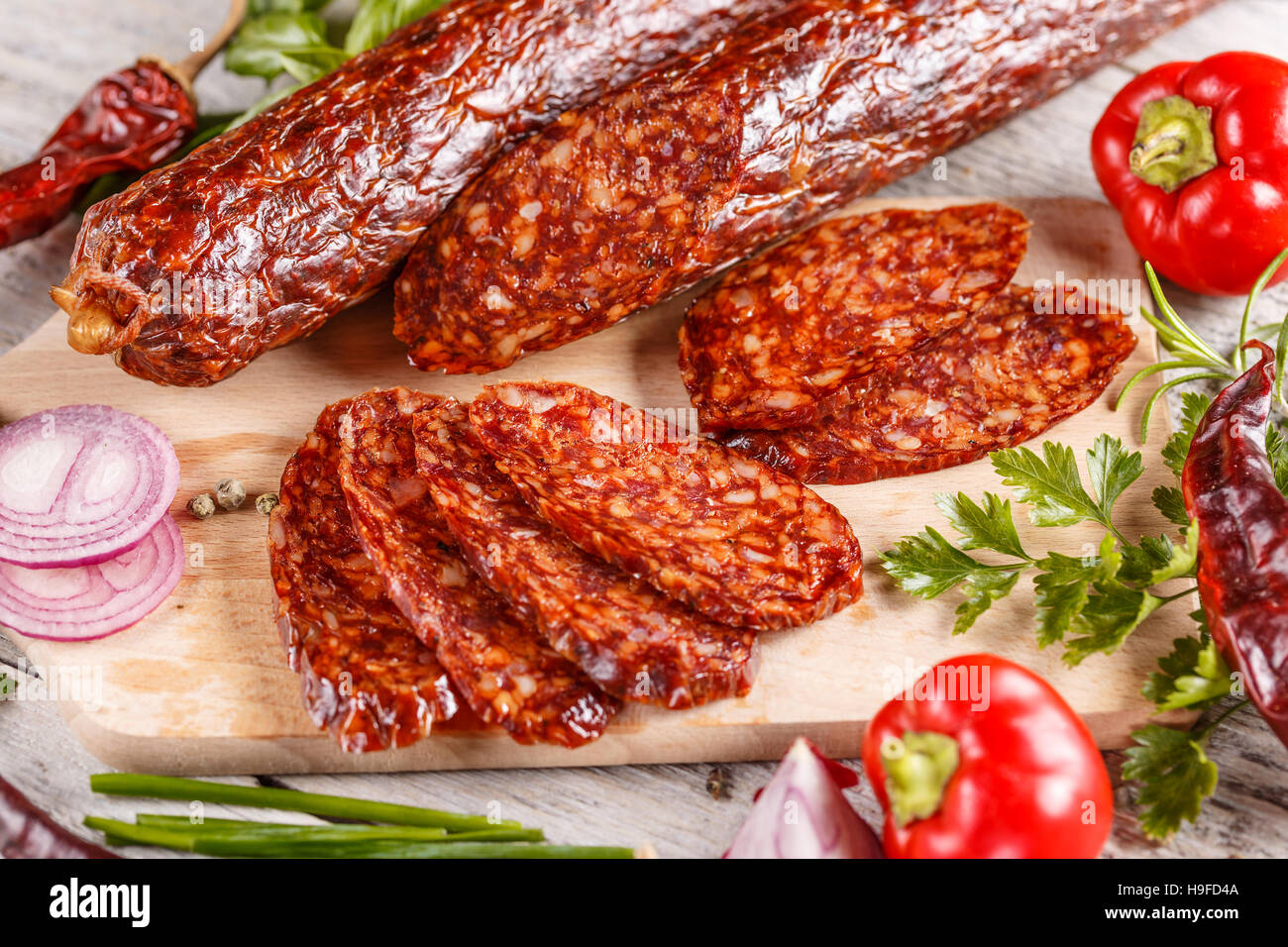 Salami sausages sliced Stock Photo - Alamy