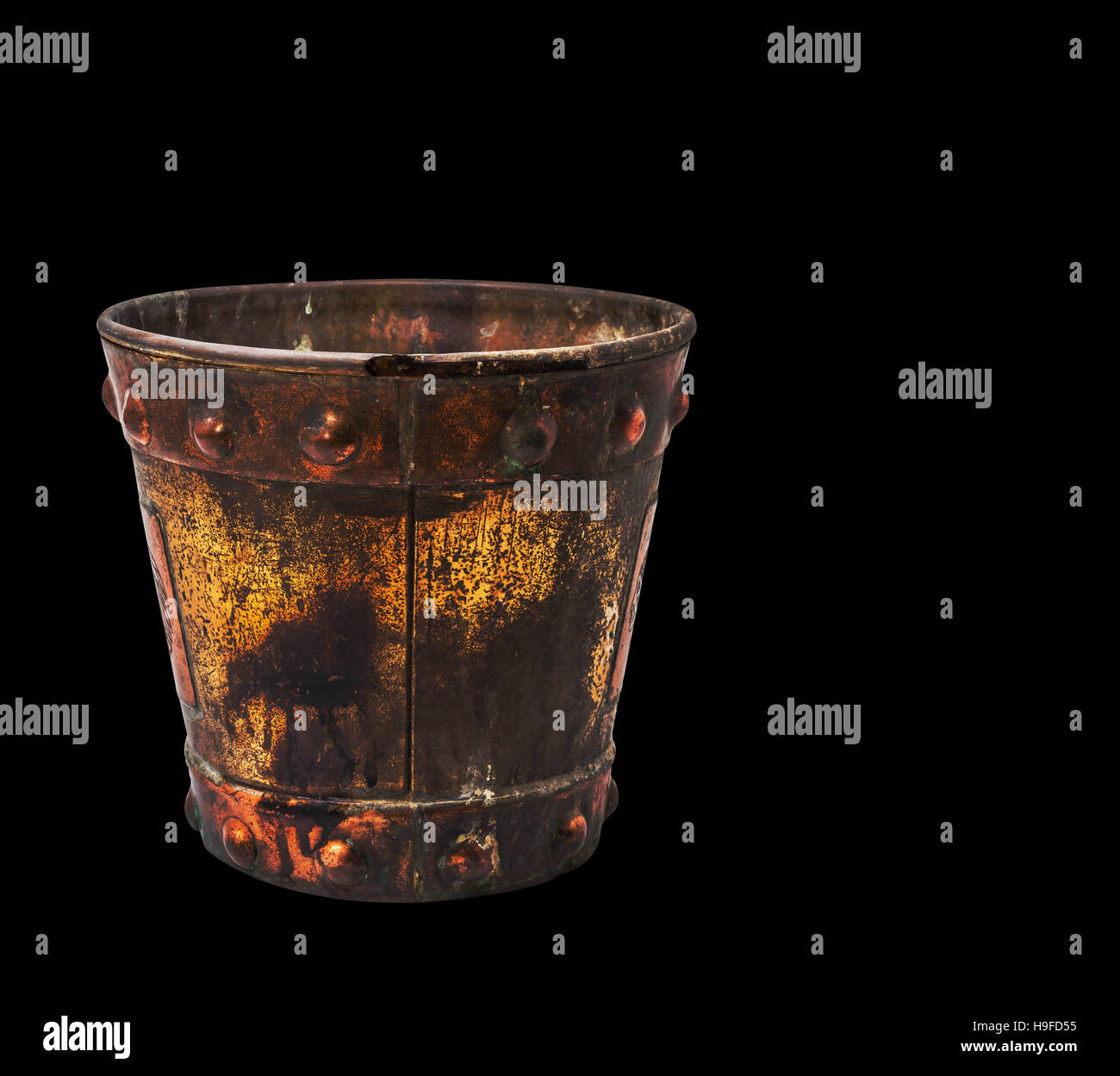 Old and rusty bucket on a black background Stock Photo - Alamy