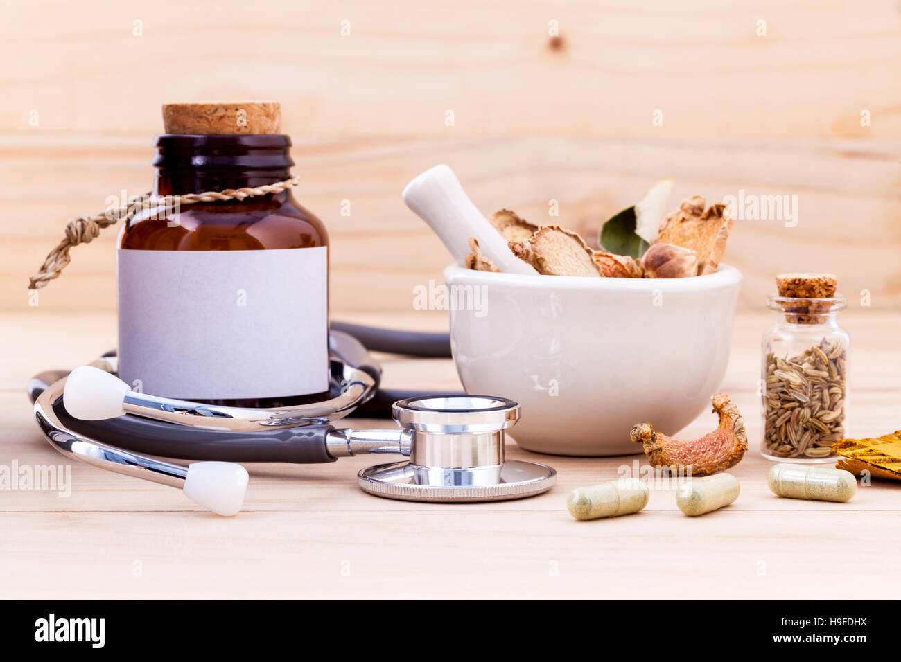 Capsule of herbal medicine alternative healthy care with stethos Stock ...