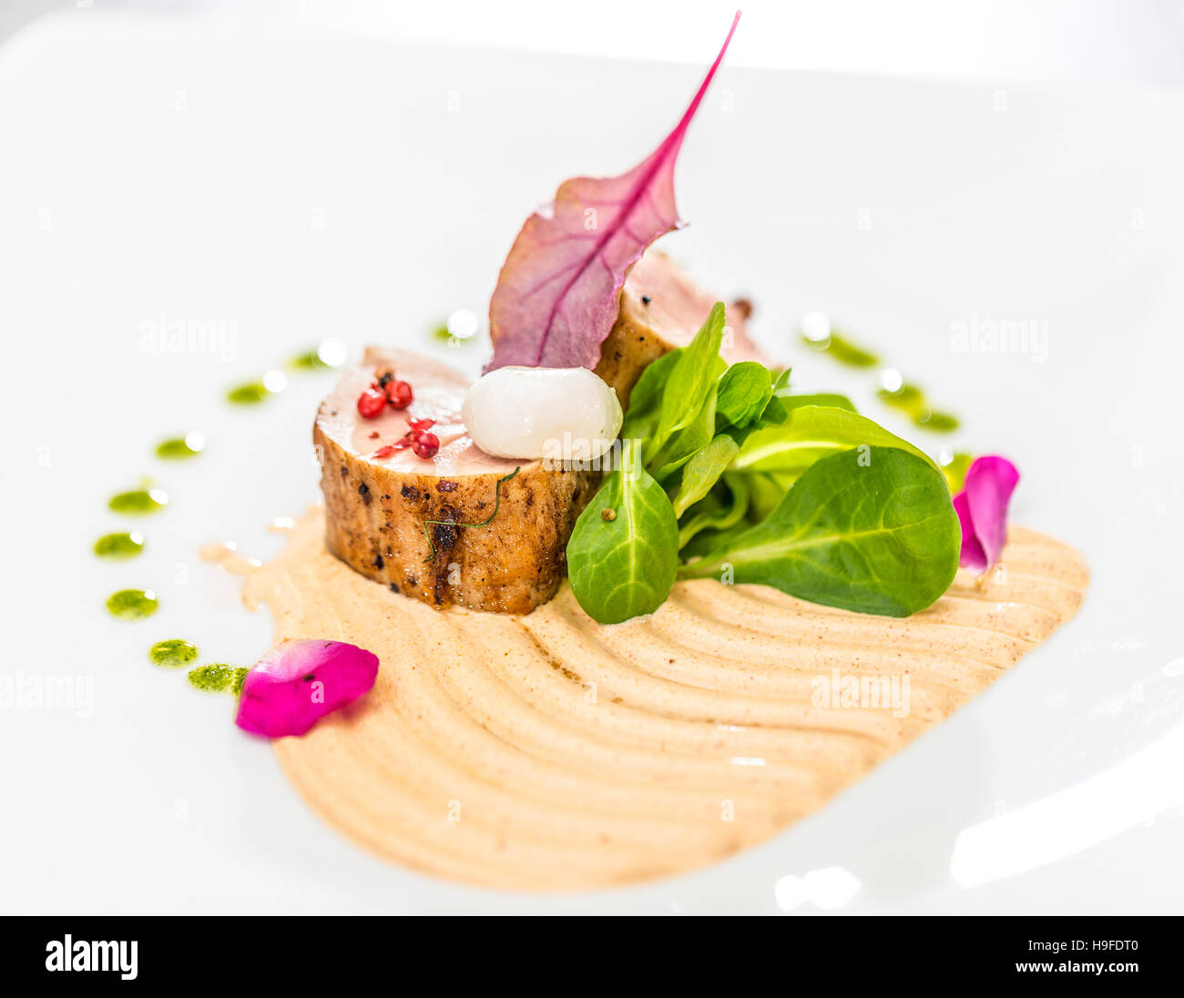 Loin pork confit steak Stock Photo - Alamy