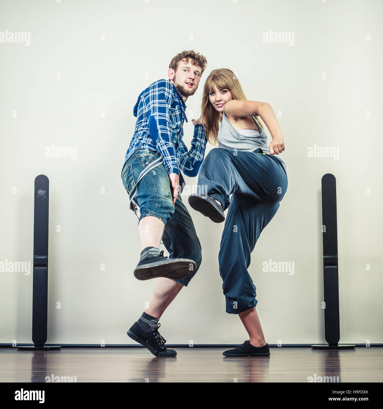 Two modern dancers couple woman and man dancing. Urban lifestyle. Hip ...