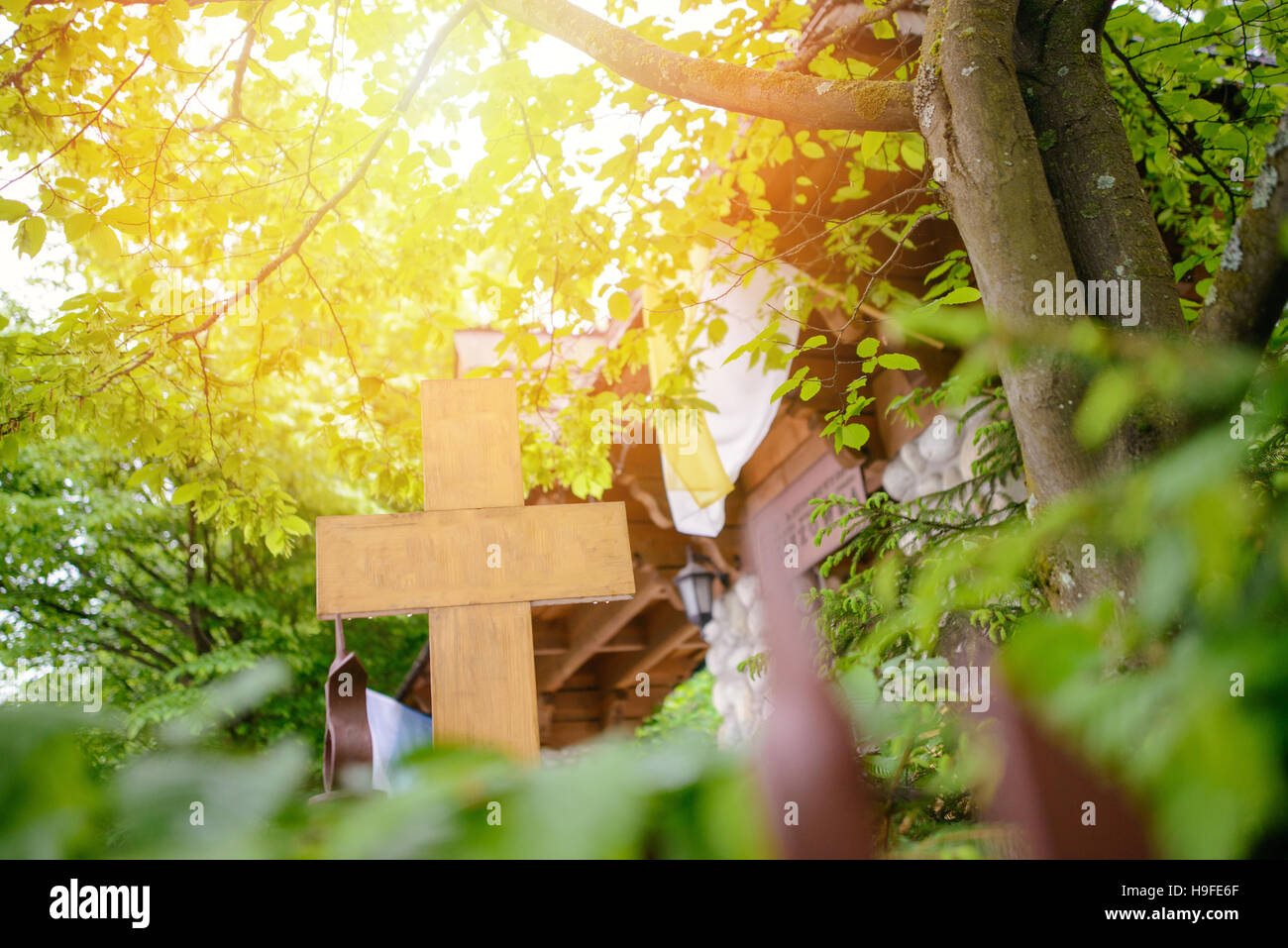 Wooden cross in the forest Stock Photo - Alamy