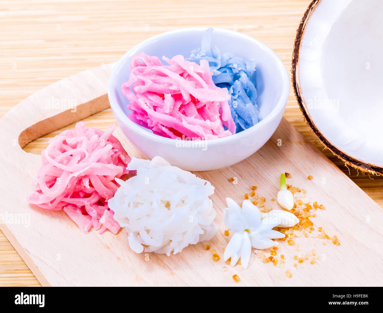 A colorful traditional coconut dessert made from grated coconut Stock ...