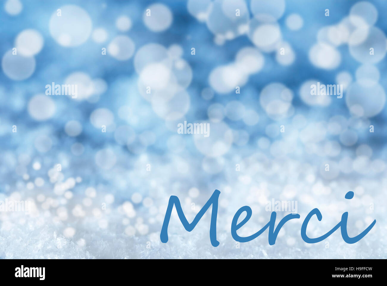 Blue Bokeh Christmas Background, Snow, Merci Means Thank You Stock ...