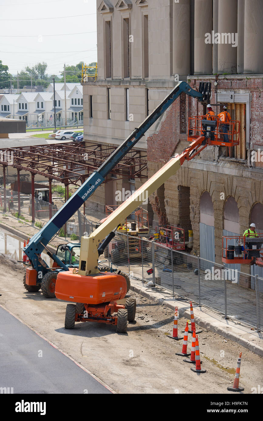 Two Cherry-Pickers and construction crews at work in Omaha, Nebraska ...