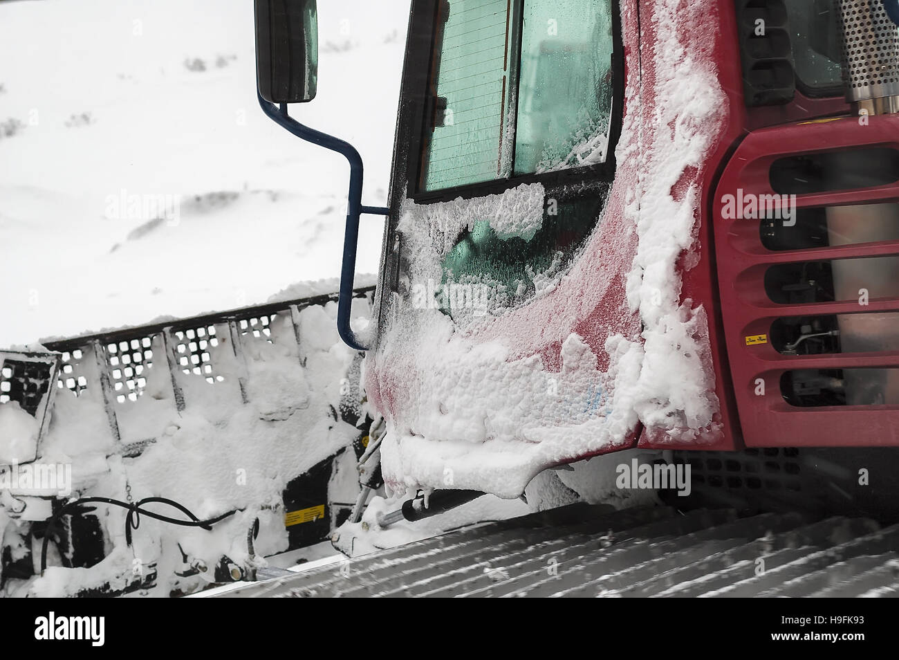 Frozen snowplow in snow blizzard Stock Photo - Alamy