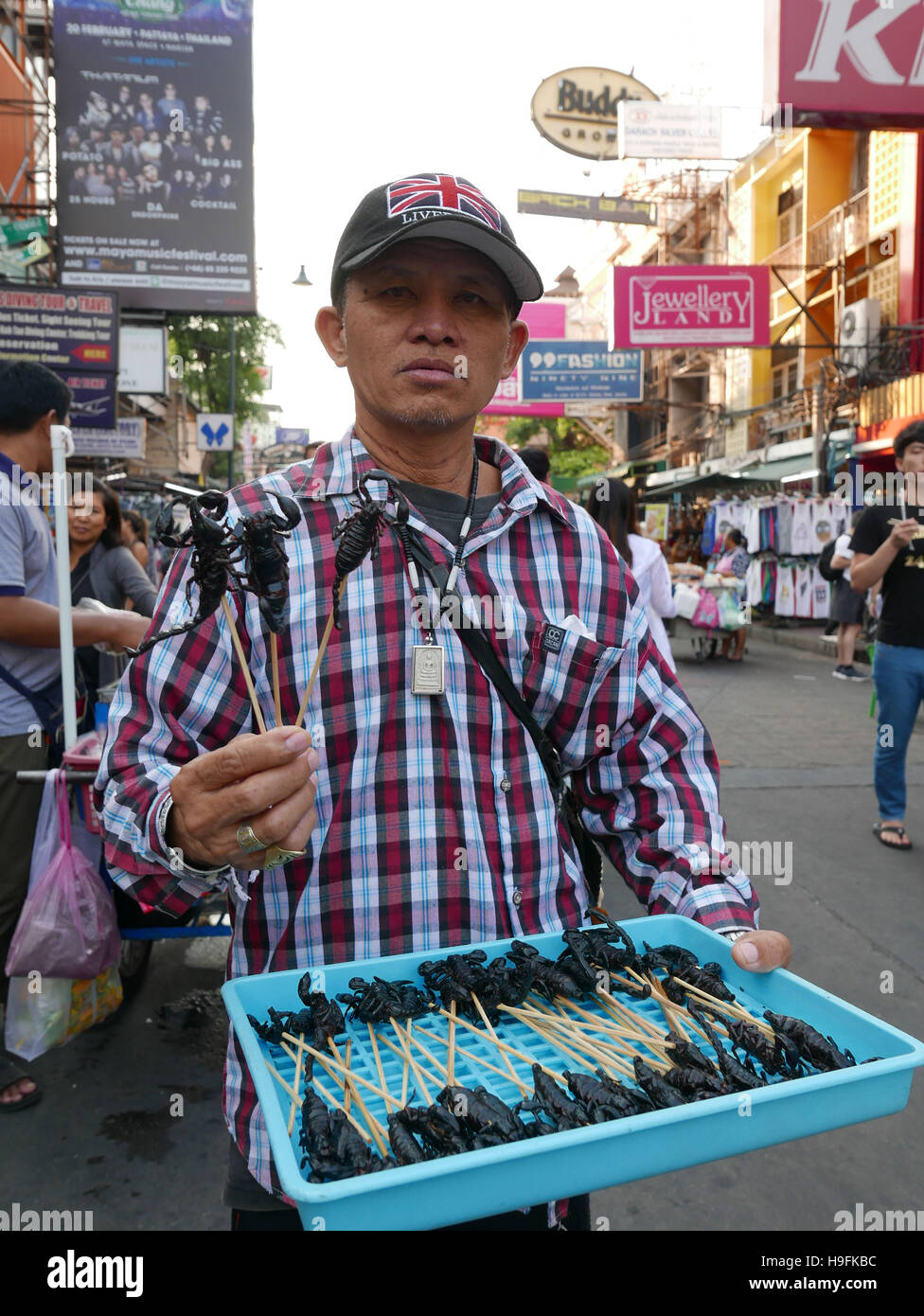 THAILAND Bangkok. Khao San Road. Man selling scorpions to eat. Sean ...