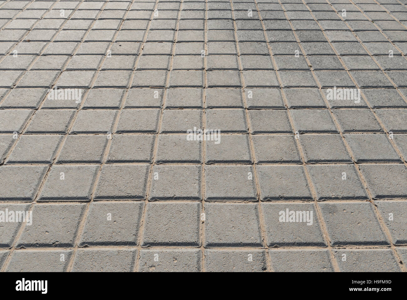 Concrete paving stone pattern Stock Photo - Alamy