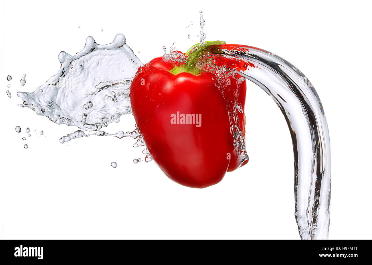Water splash with bell pepper isolated Stock Photo - Alamy
