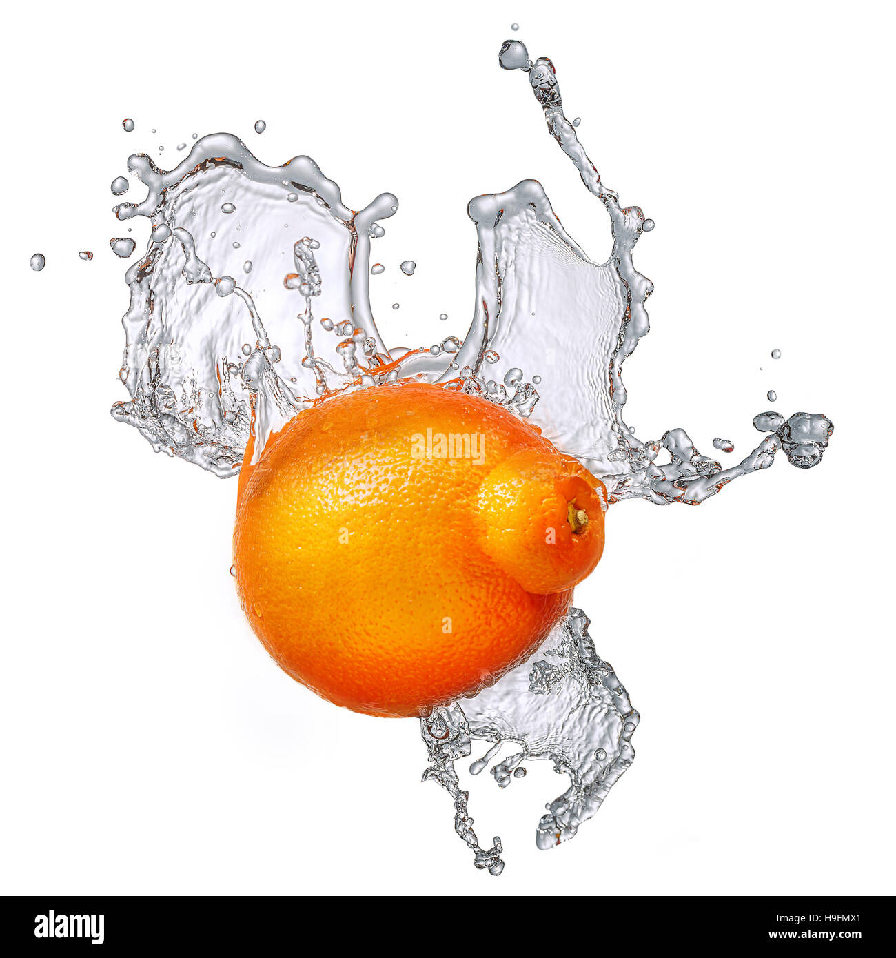 Water splash with mandarin isolated Stock Photo - Alamy