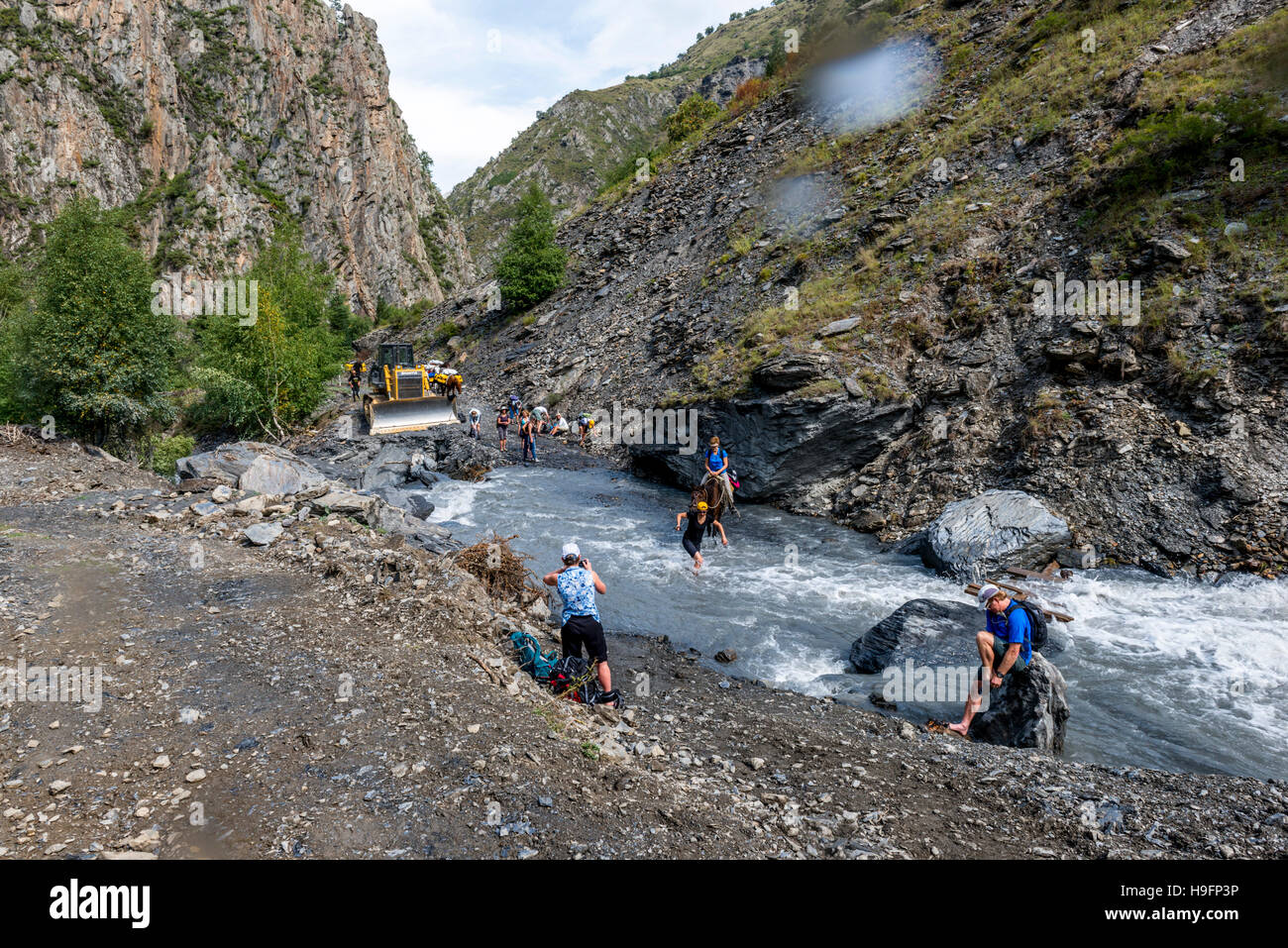 Crossing washed out road in Republic of Georgia Stock Photo - Alamy