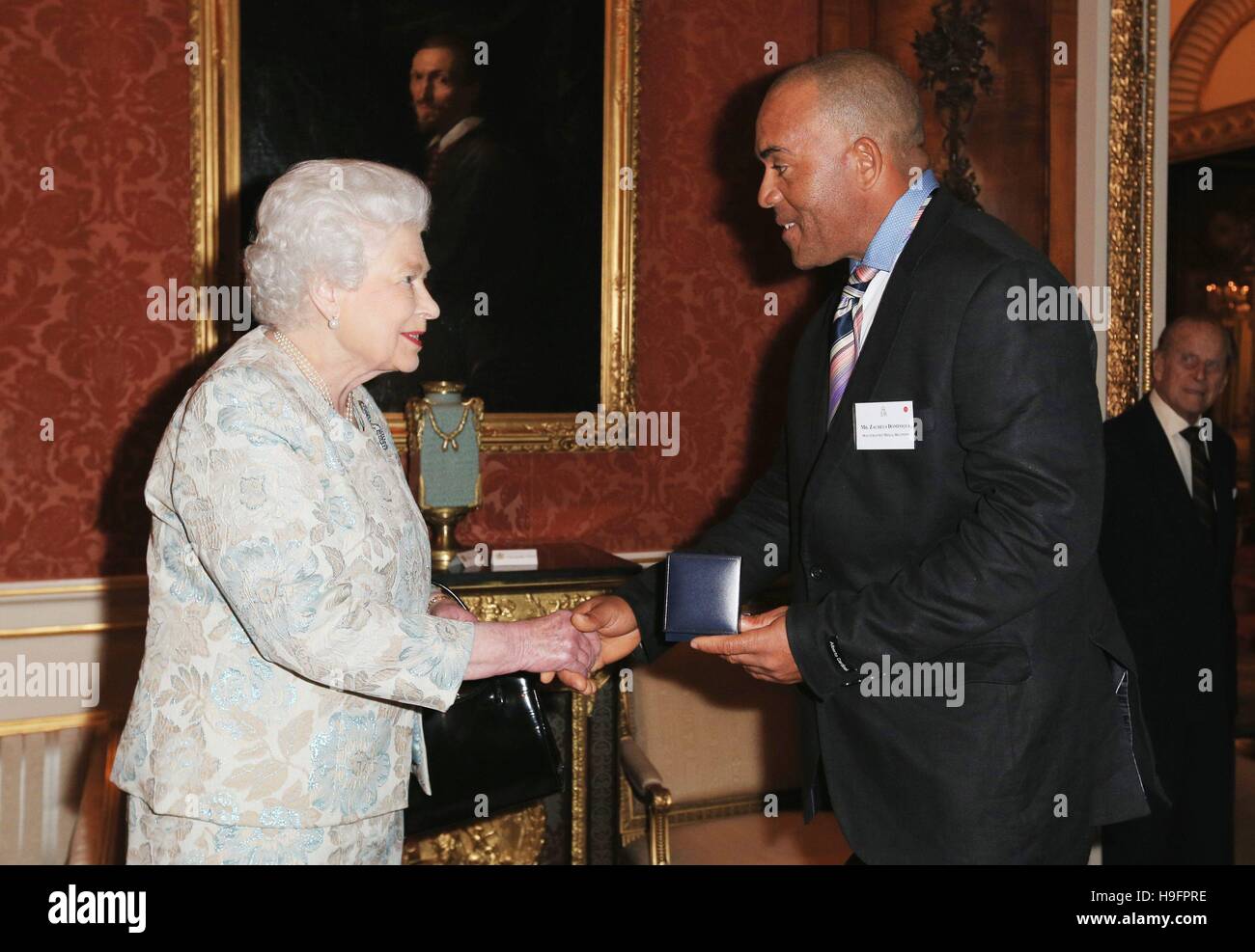Queen Elizabeth II awards Zac Dominic, from St Lucia with the ...