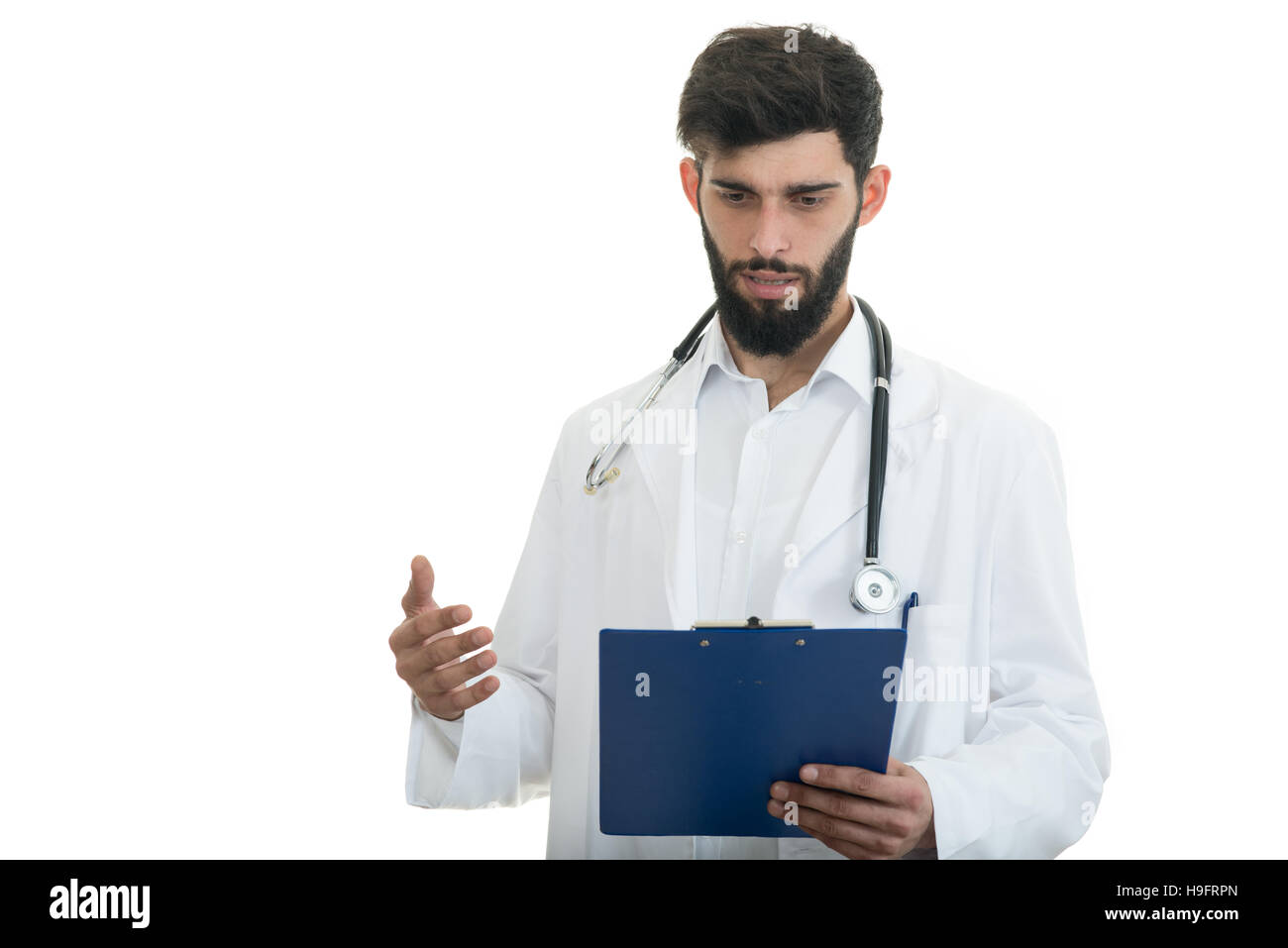 Male Doctor standing with folder, isolated on white background Stock ...