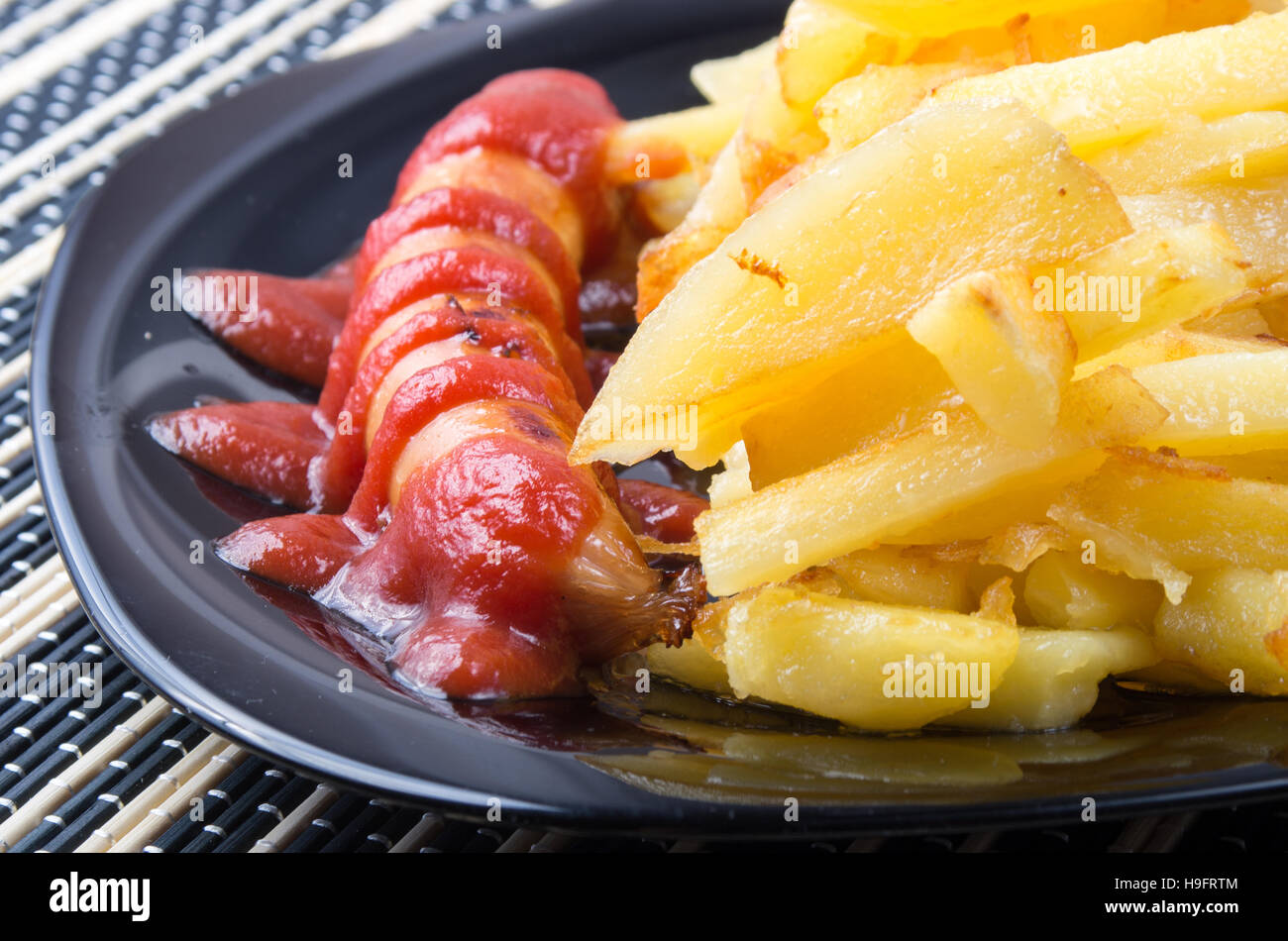 Russian national dish - fried sausage with tomato ketchup and a side ...