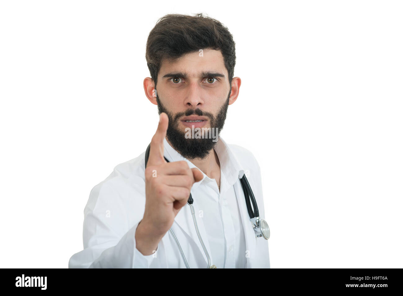A close-up portrait of a rude, frustrated, upset doctor isolated on a ...