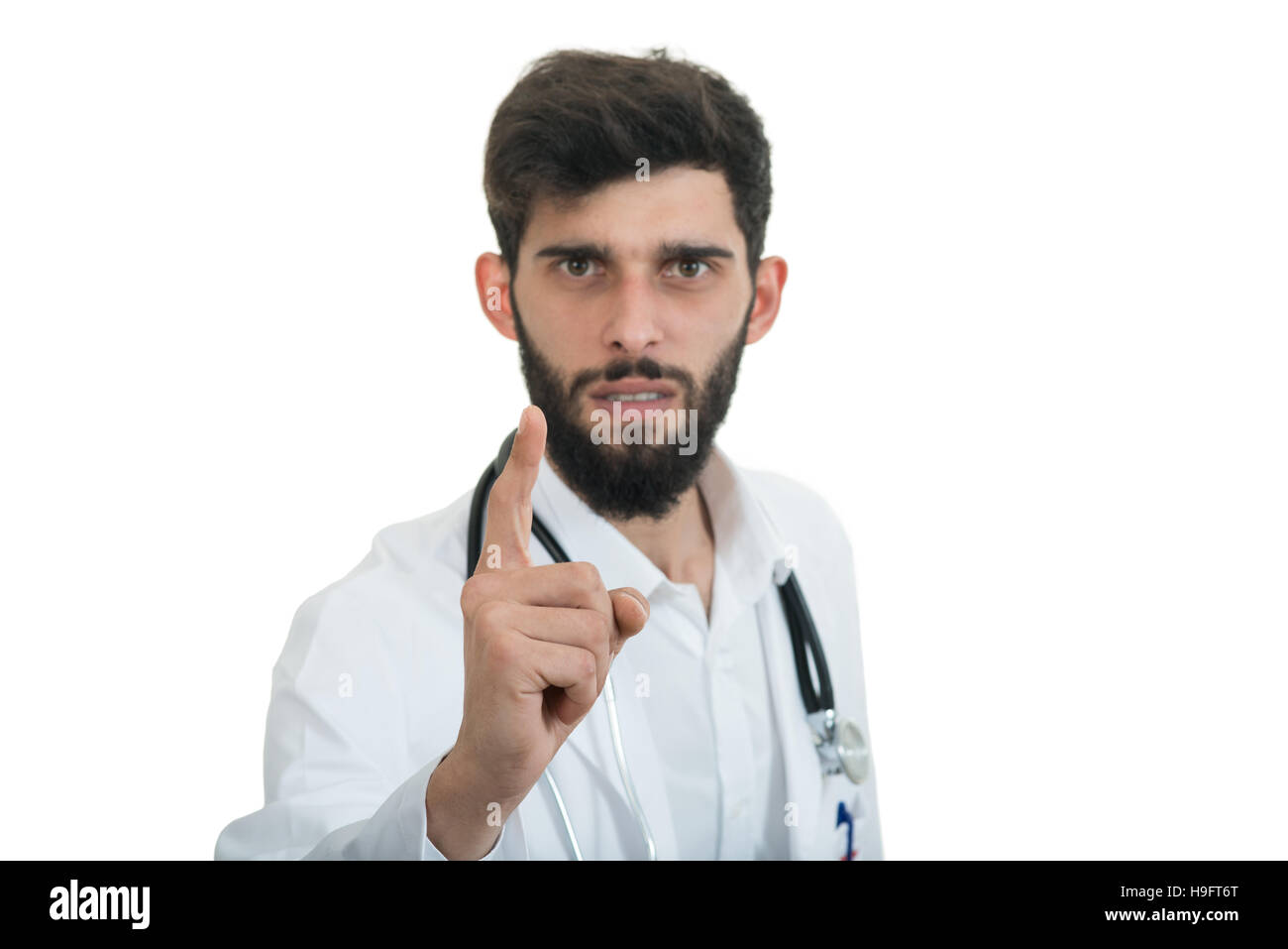 A close-up portrait of a rude, frustrated, upset doctor isolated on a ...