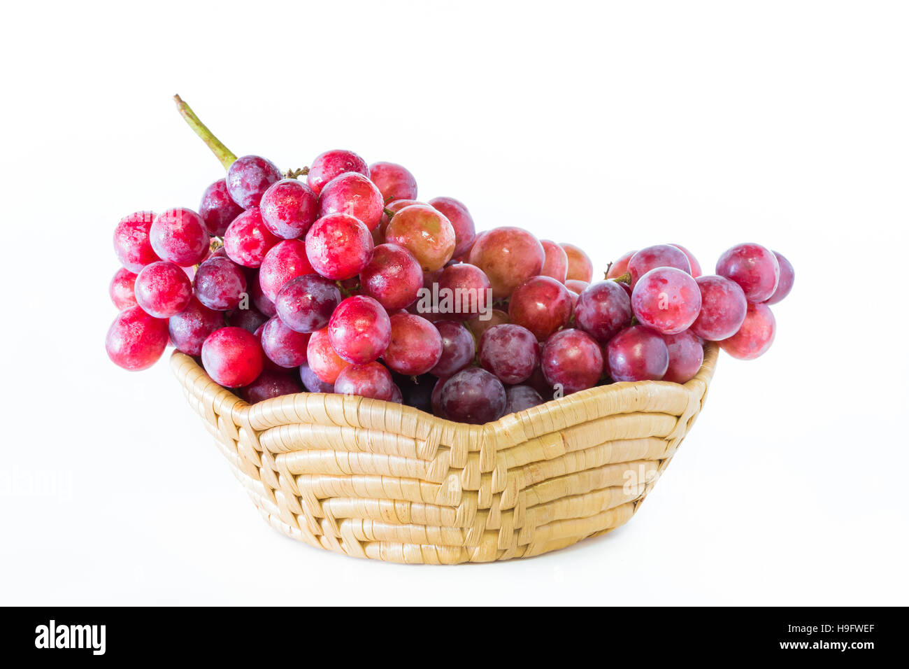 Grape in a fruit tray Isolated on white background Stock Photo - Alamy