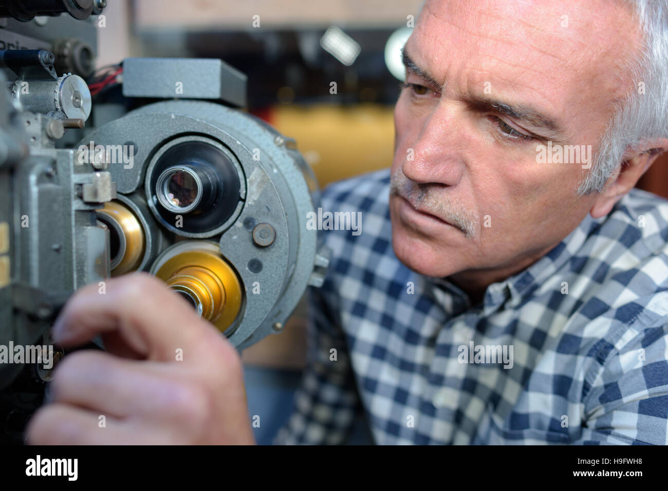 worker on machine Stock Photo - Alamy